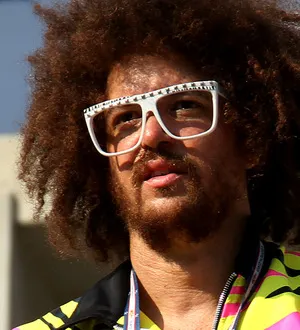 Redfoo coaching junior tennis player | Young Hollywood