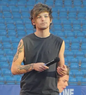 One Direction attend Louis Tomlinson's family wedding | Young Hollywood