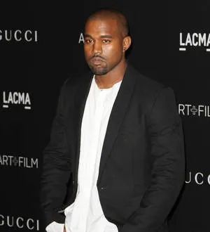 Vogue bosses beat lawsuit over Kanye West and Kim Kardashian video song ...