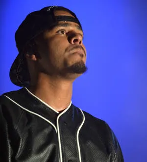 J. Cole attends fan's high school graduation | Young Hollywood